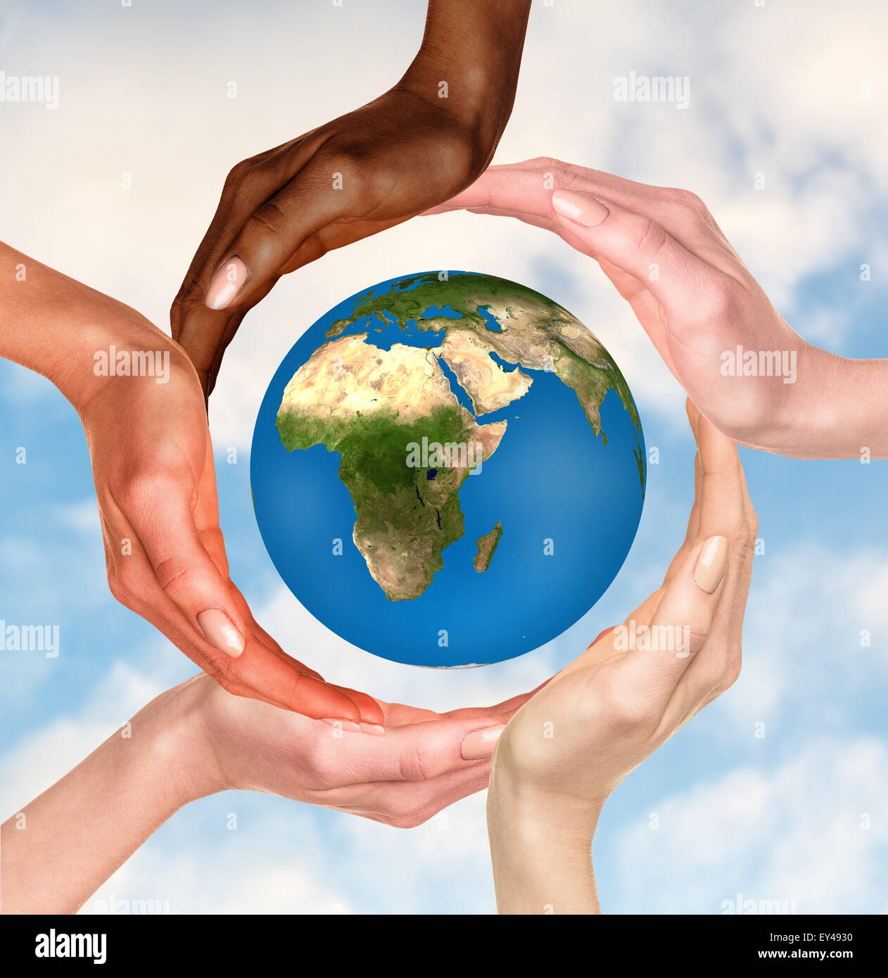 Hands around globe hi-res stock photography and images - Alamy