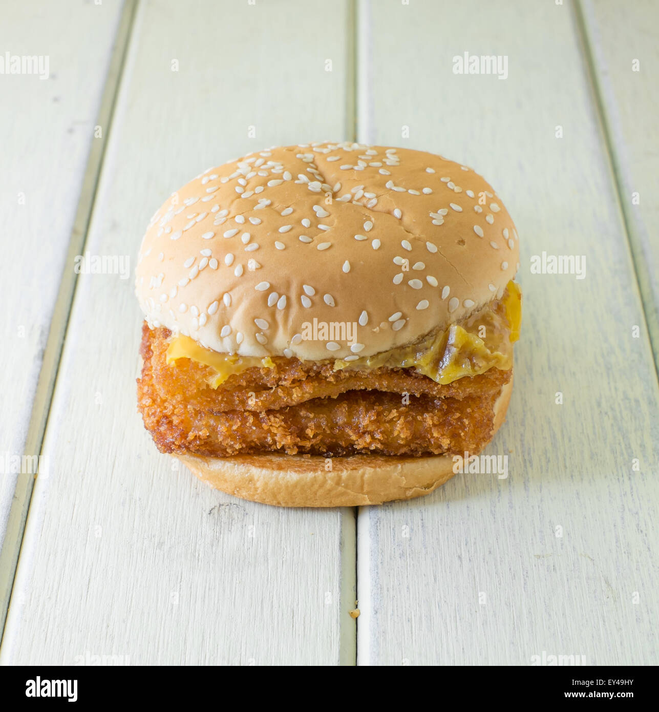 double fish cheese burger Stock Photo - Alamy