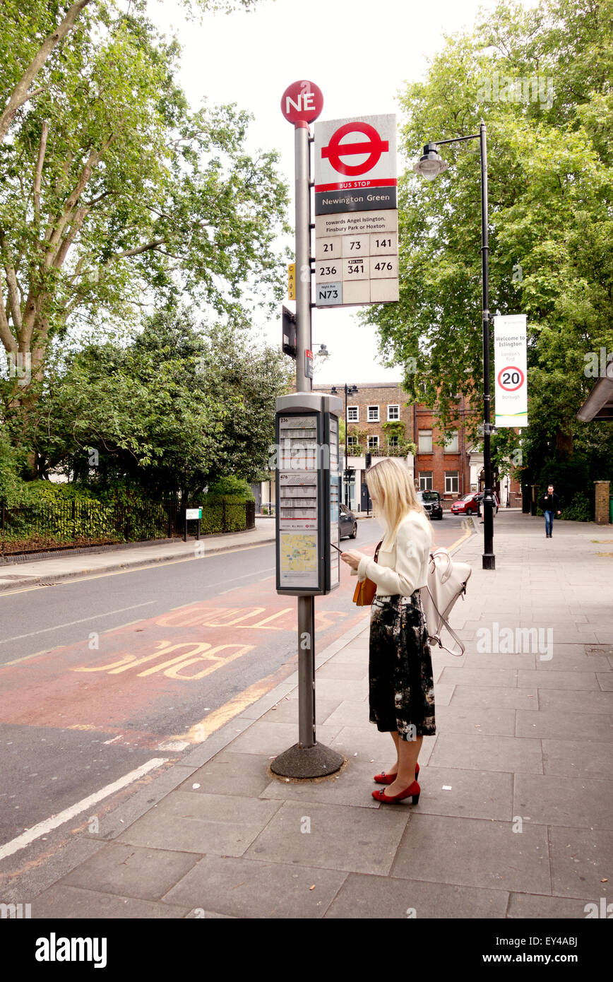 Woman Waiting Alone Bus Stop Stock Photos & Woman Waiting Alone Bus ...