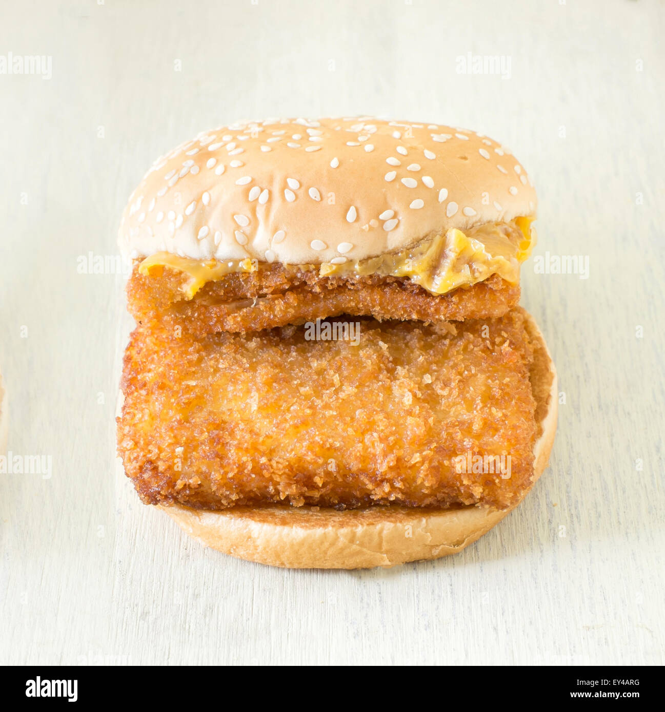 double fish cheese burger Stock Photo - Alamy