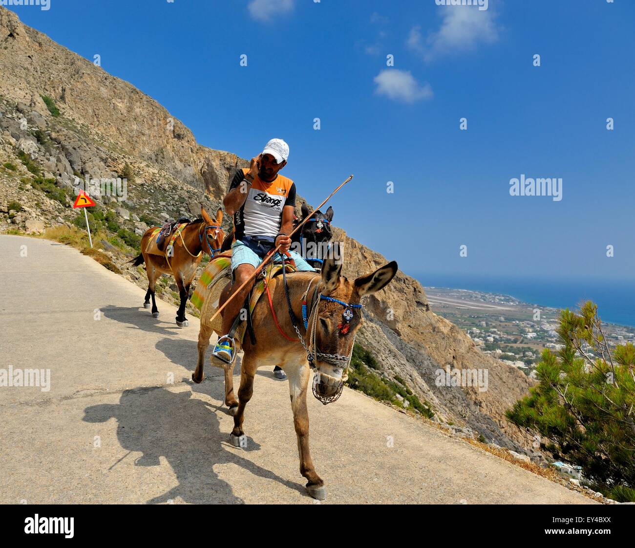 Local man riding a donkey hi-res stock photography and images - Alamy