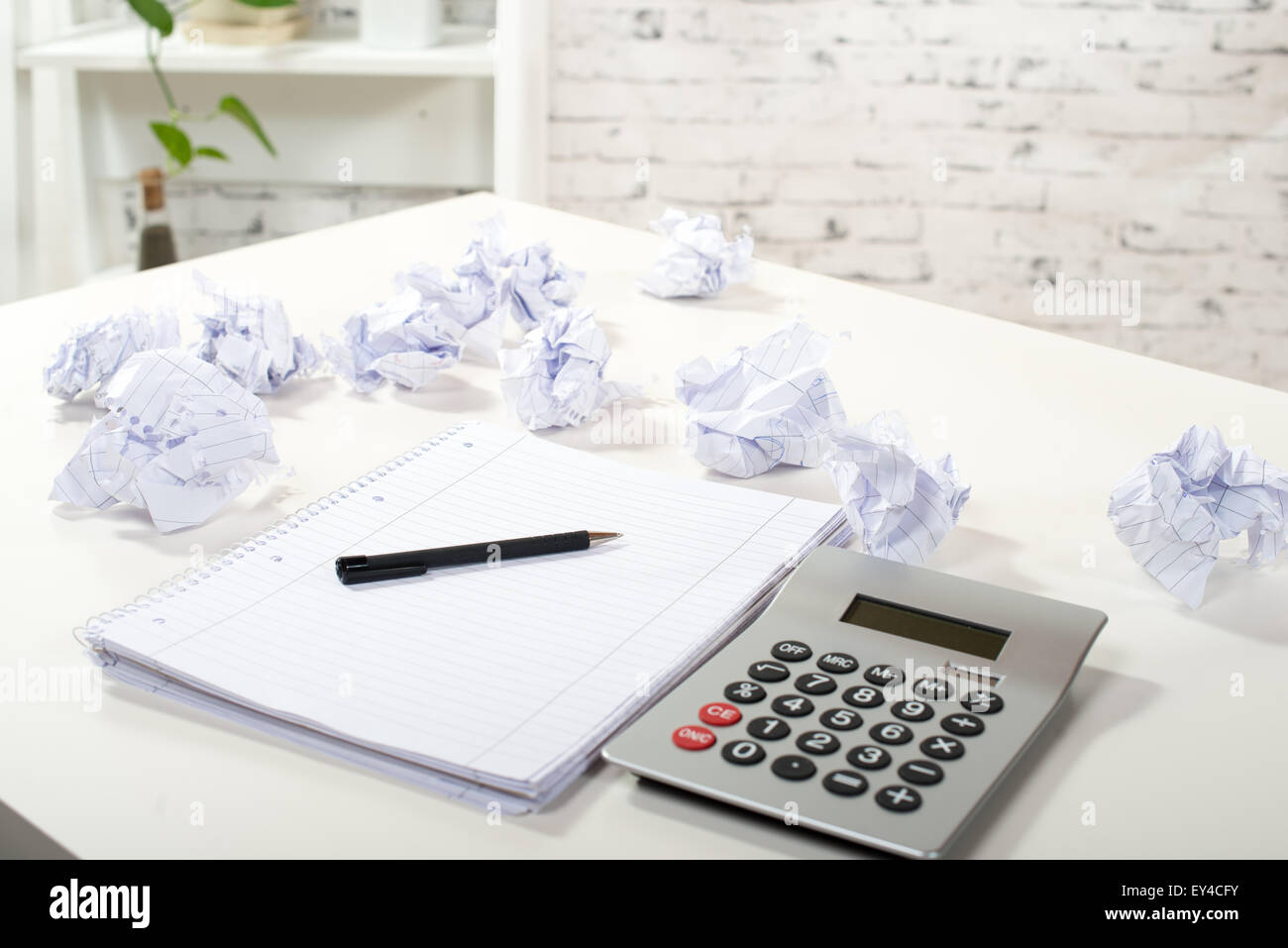 block notes with crumpled paper on white table Stock Photo - Alamy