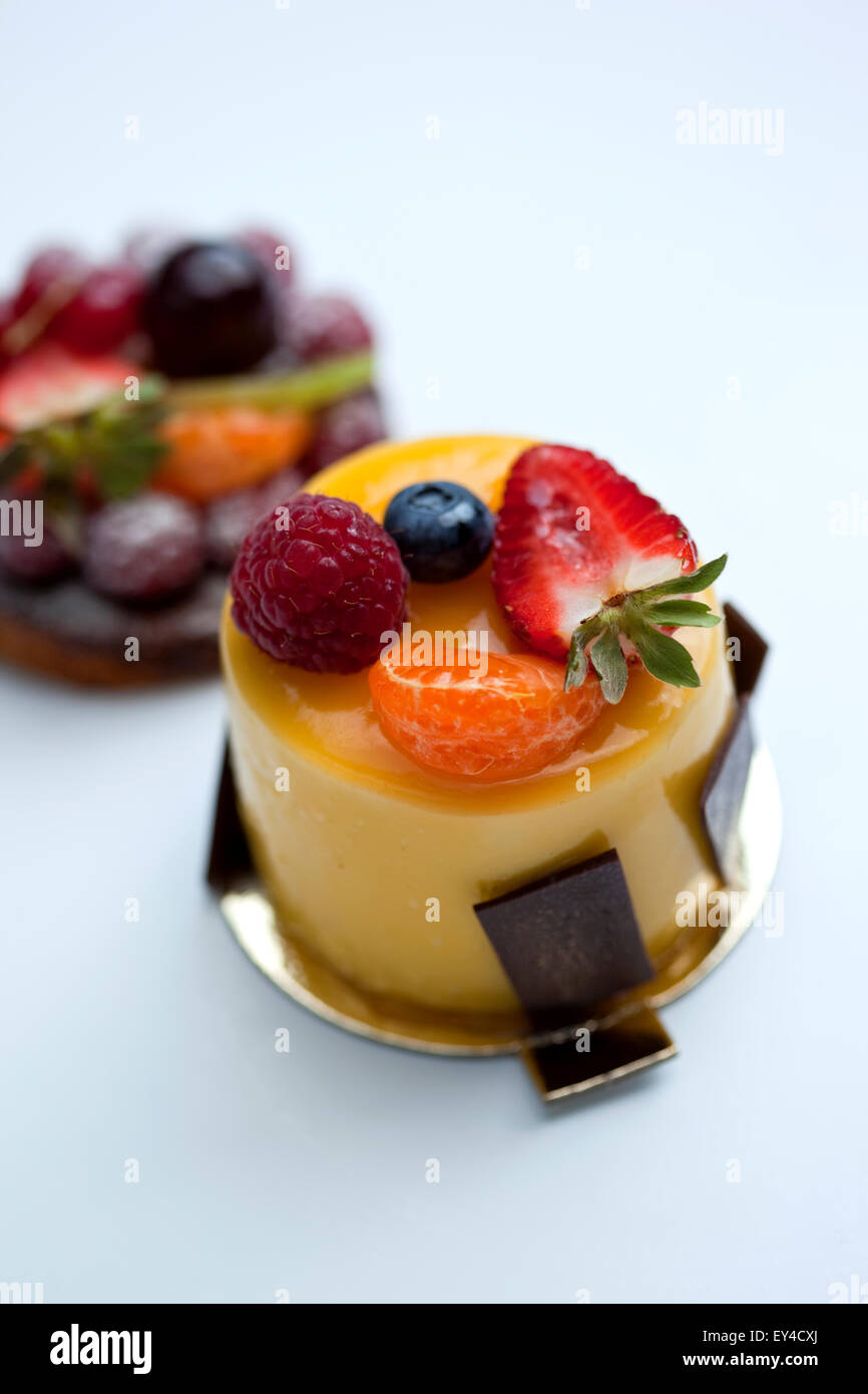 Raspberries cake, mango mousse and various fruits Stock Photo - Alamy