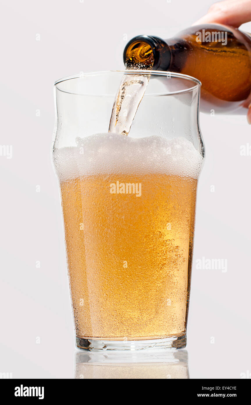 Close up pouring beer glass hi-res stock photography and images - Alamy