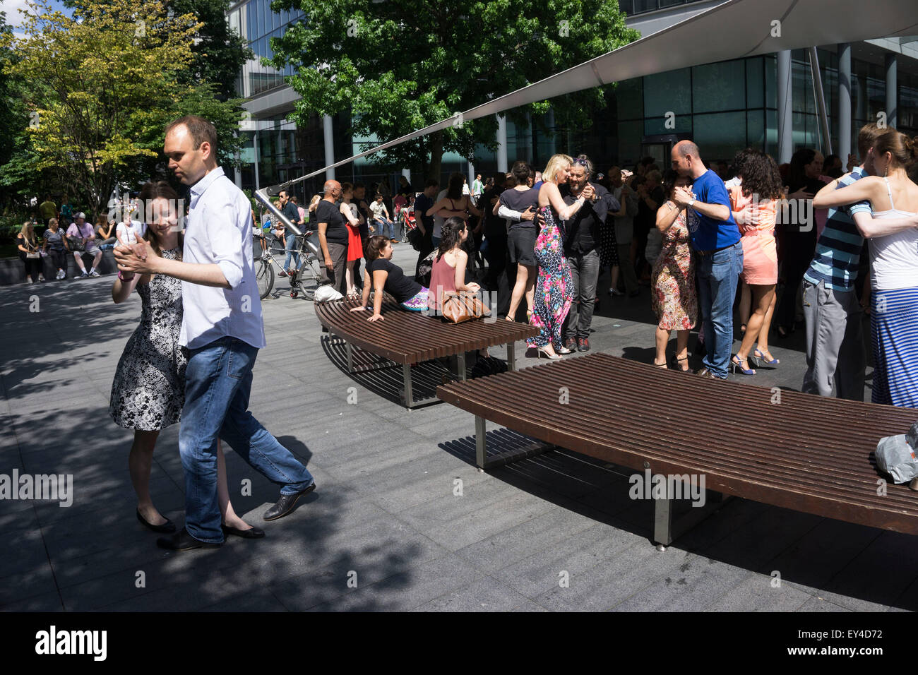 Tango dancing in Spitalfields, London, UK. This crowd of people has ...