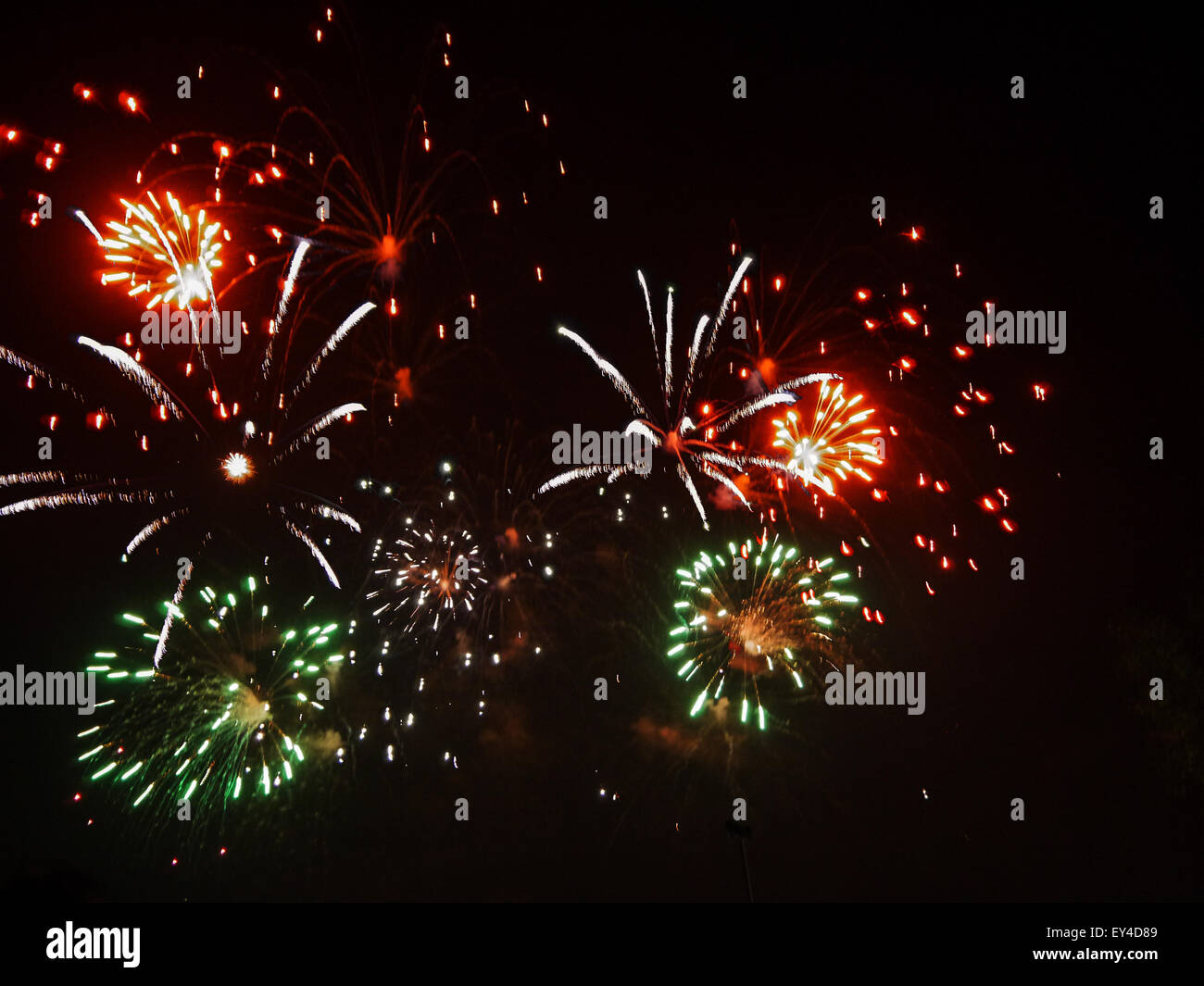 Colorful fireworks on the black sky background Stock Photo - Alamy