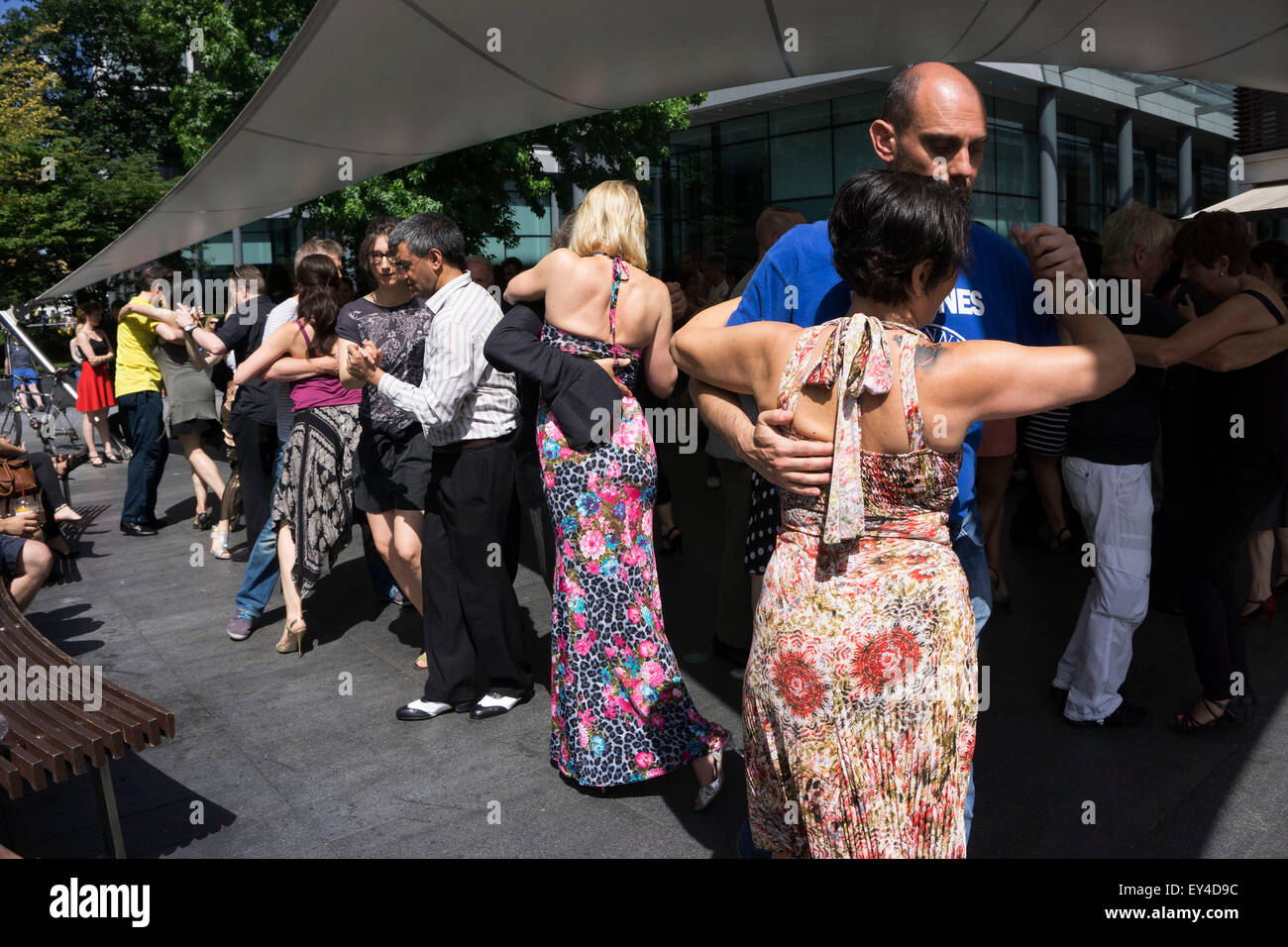 Tango dancing in Spitalfields, London, UK. This crowd of people has ...
