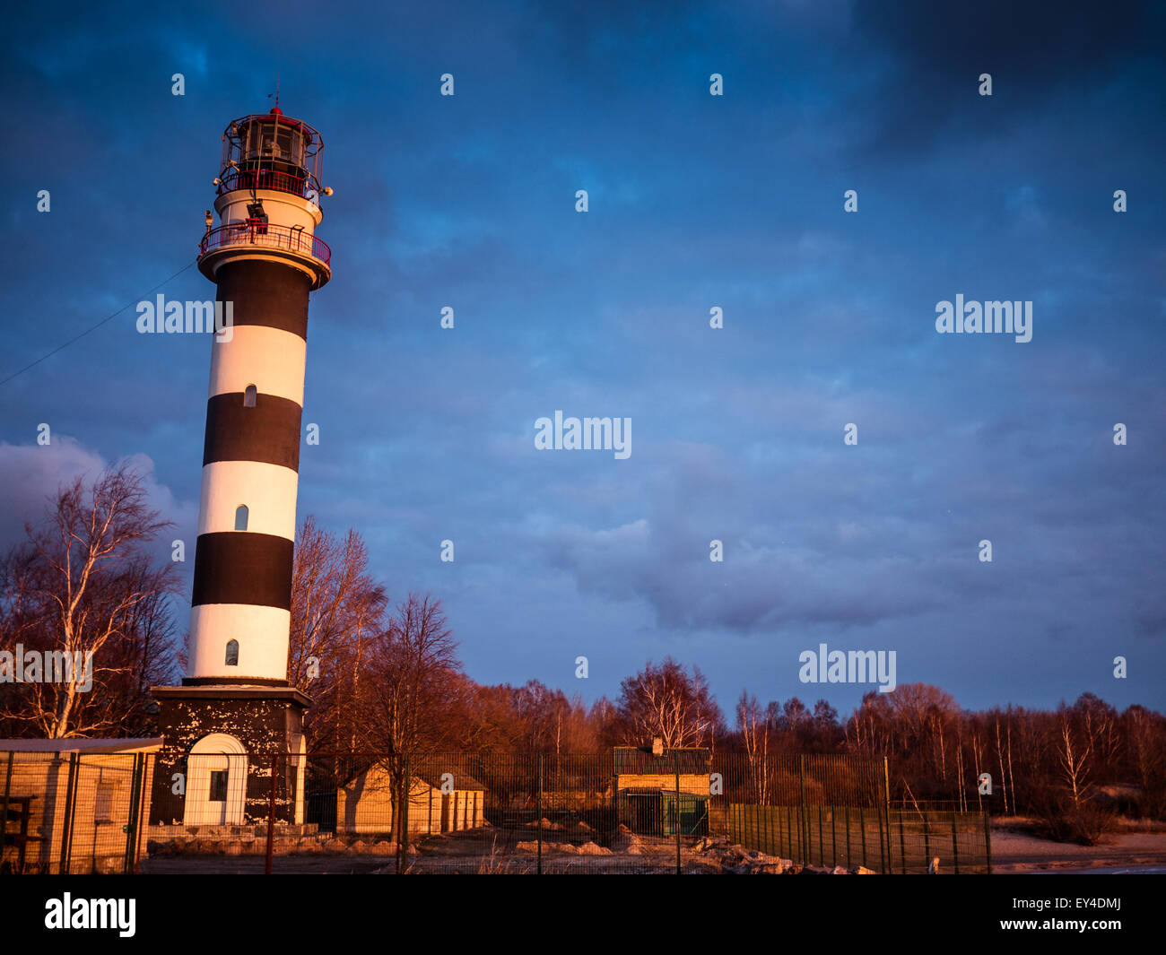 Ocean sunrise with lighthouse in Riga gulf, Baltic sea Stock Photo - Alamy
