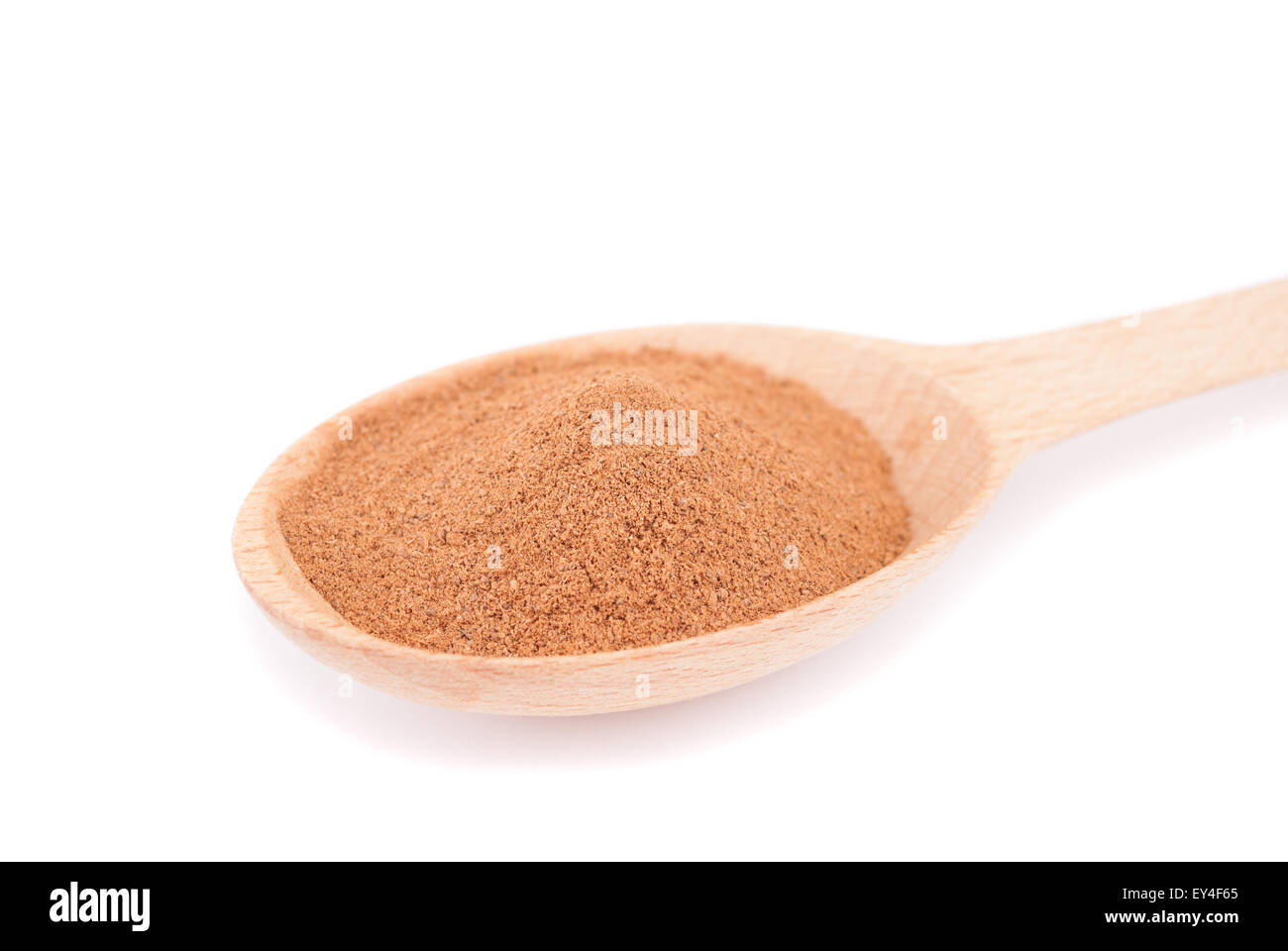 Cinnamon in the spoon isolated on a white background Stock Photo - Alamy