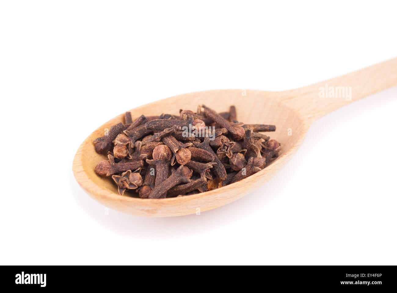 Cloves in the spoon isolated on a white background Stock Photo - Alamy
