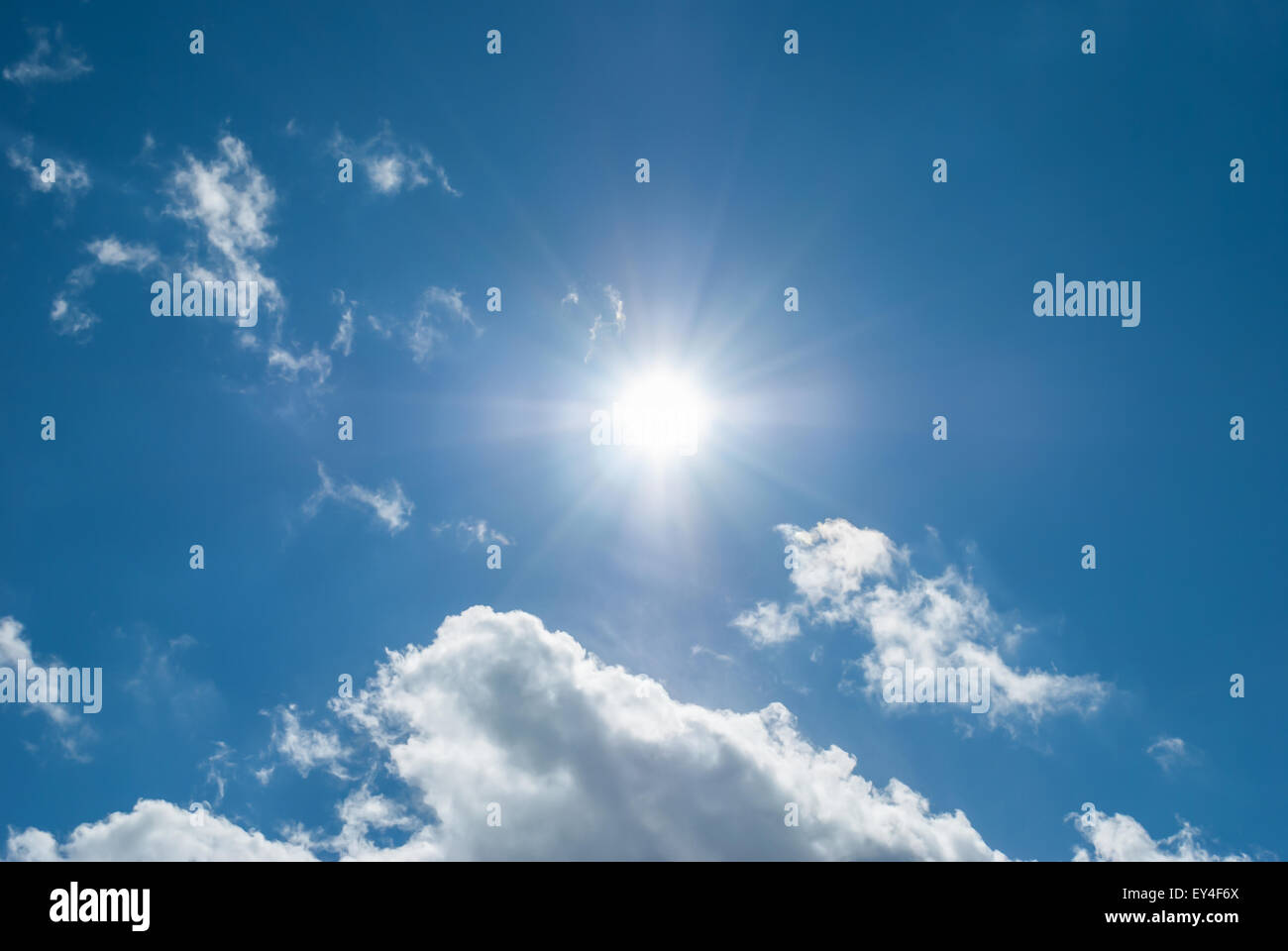 Sun emerges from behind the clouds Stock Photo - Alamy