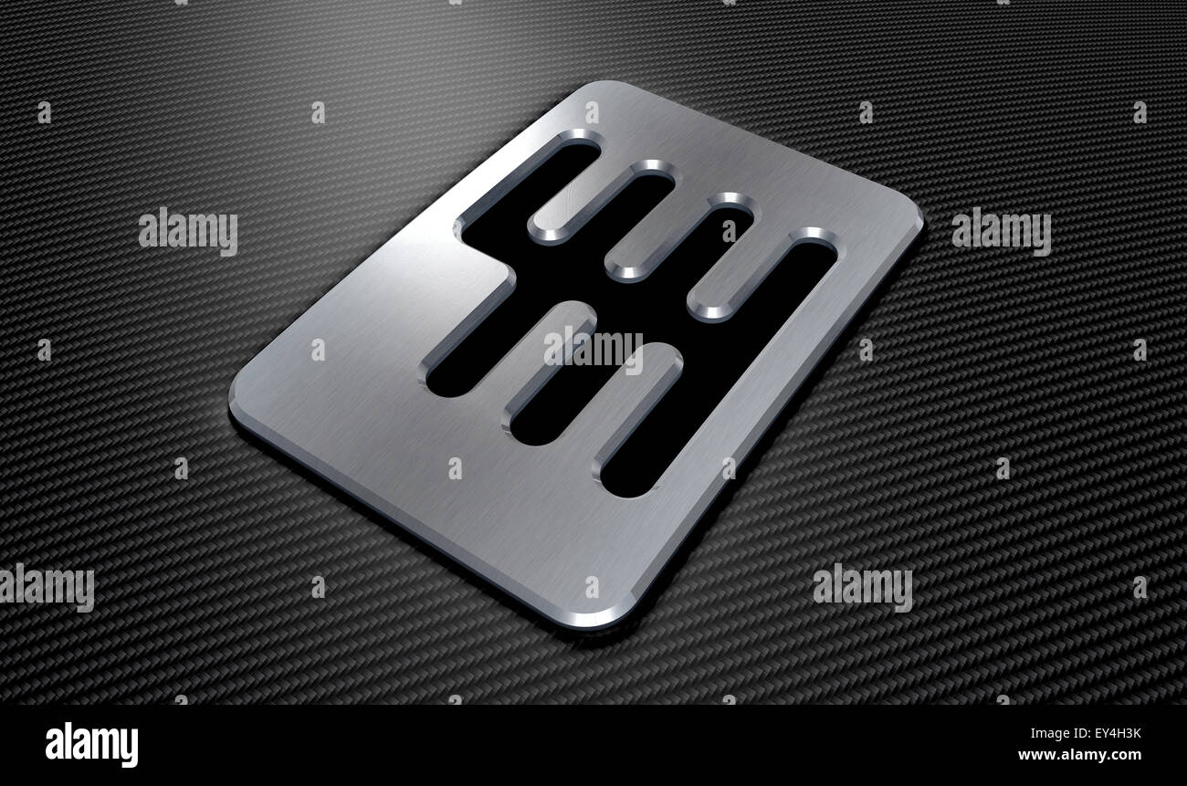 A steel chrome gear stick shift plate on a carbon fibre surface Stock ...