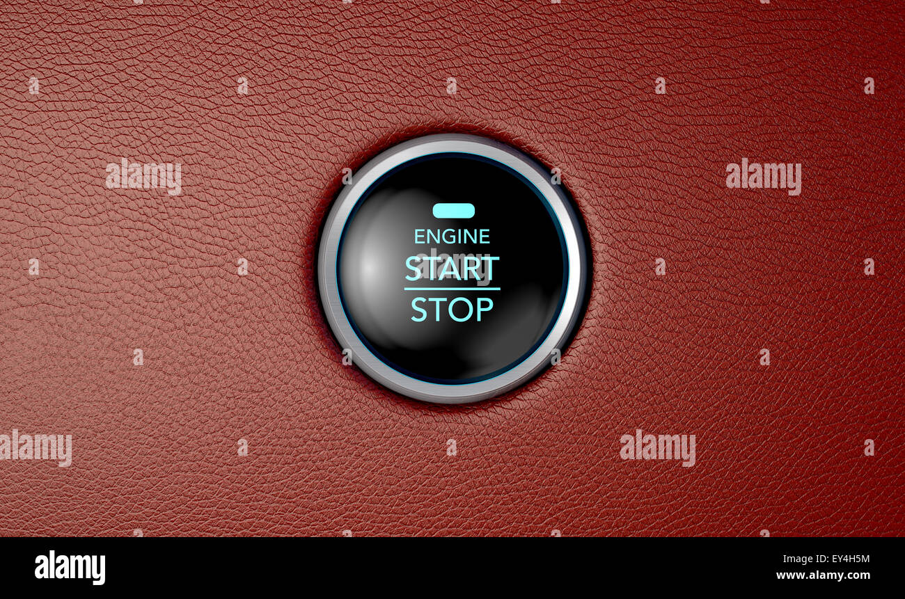 A closeup of a modern car start and stop button with blue lights on a ...