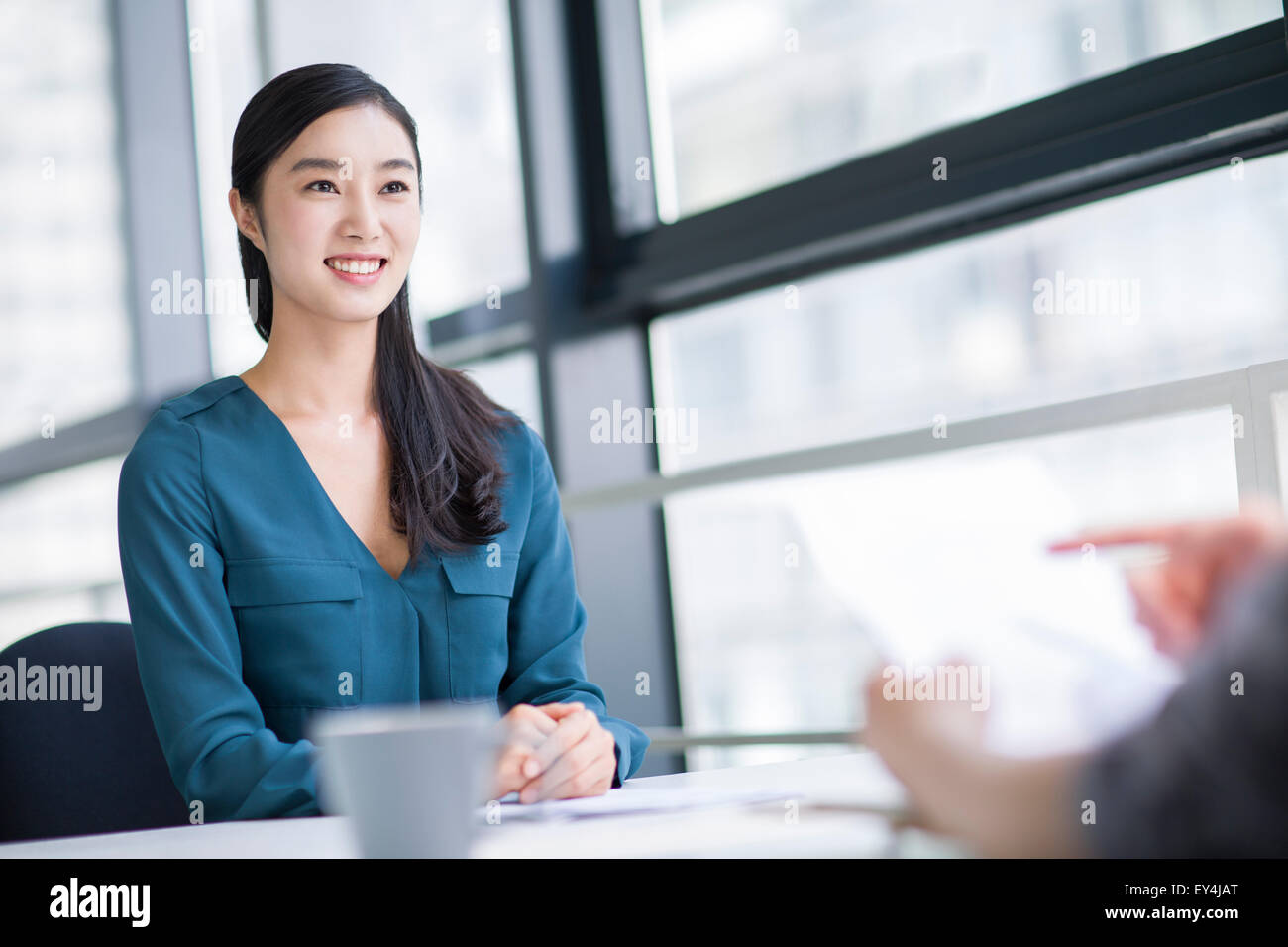 Young woman interviewing for a job Stock Photo - Alamy