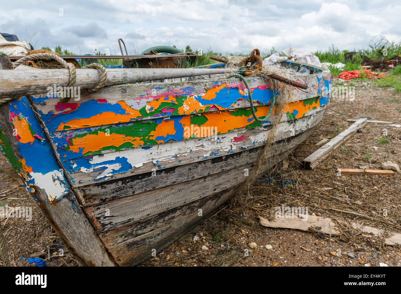 Old rotting wooden rowing boat with the layers of paint showing Stock ...