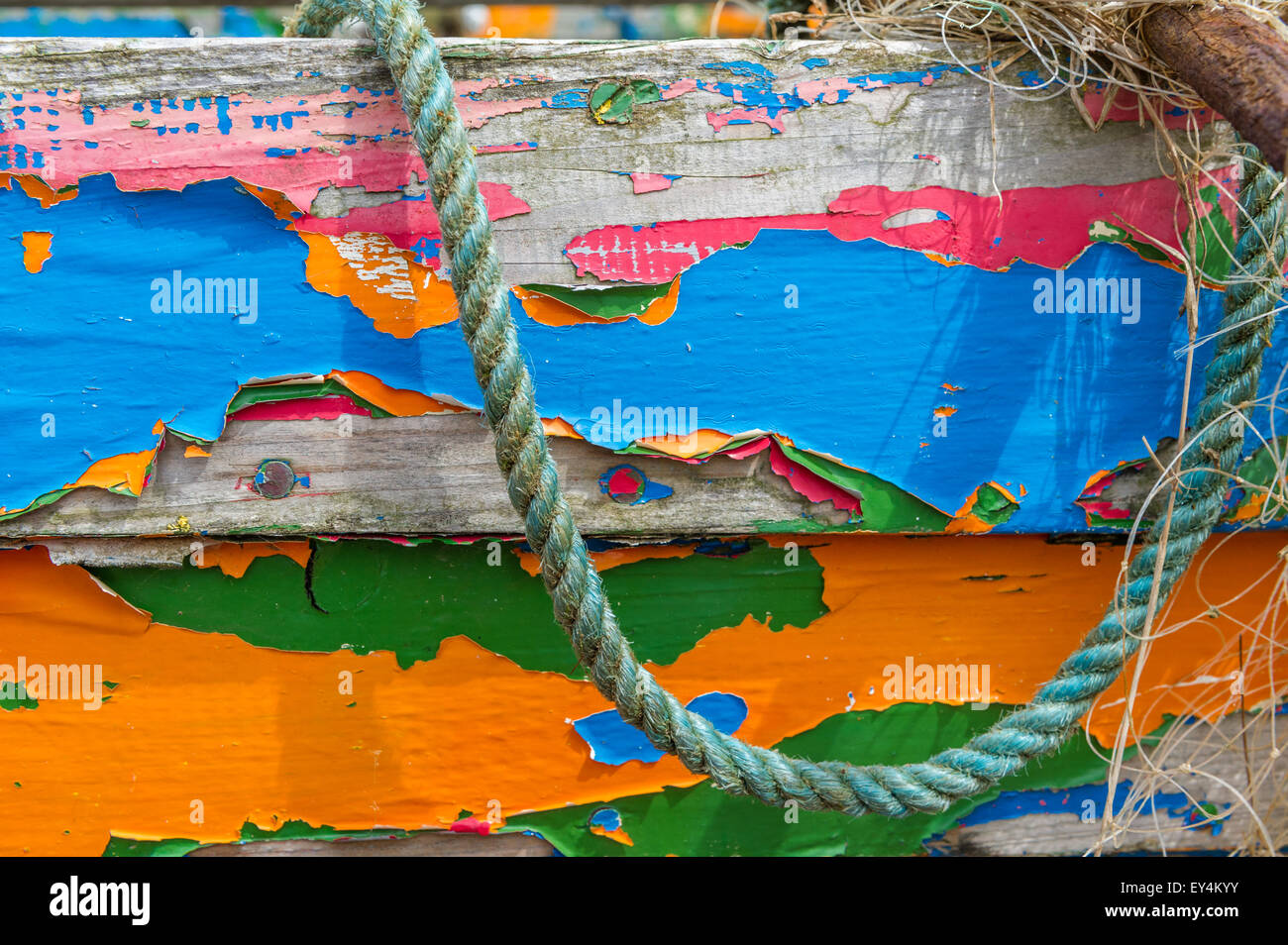 Old rotting wooden rowing boat with the layers of paint showing Stock ...