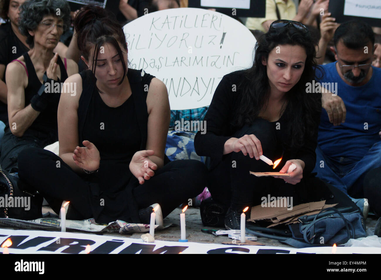Ankara, Turkey. 21st July, 2015. Demonstrators lit candles for the ...