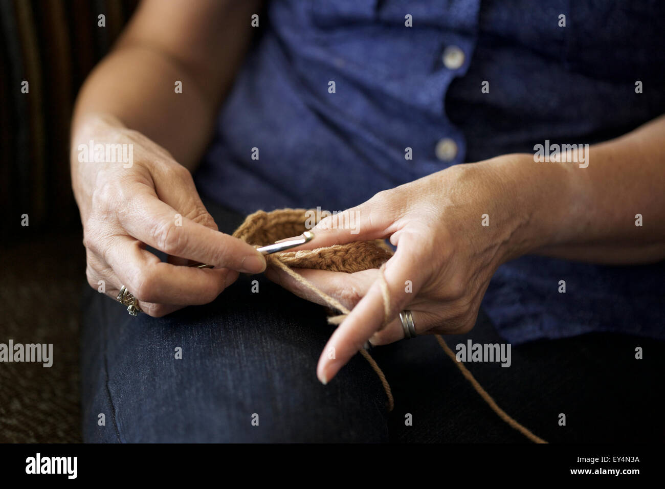 Close up picture of a Caucasian woman crocheting at home Stock Photo ...