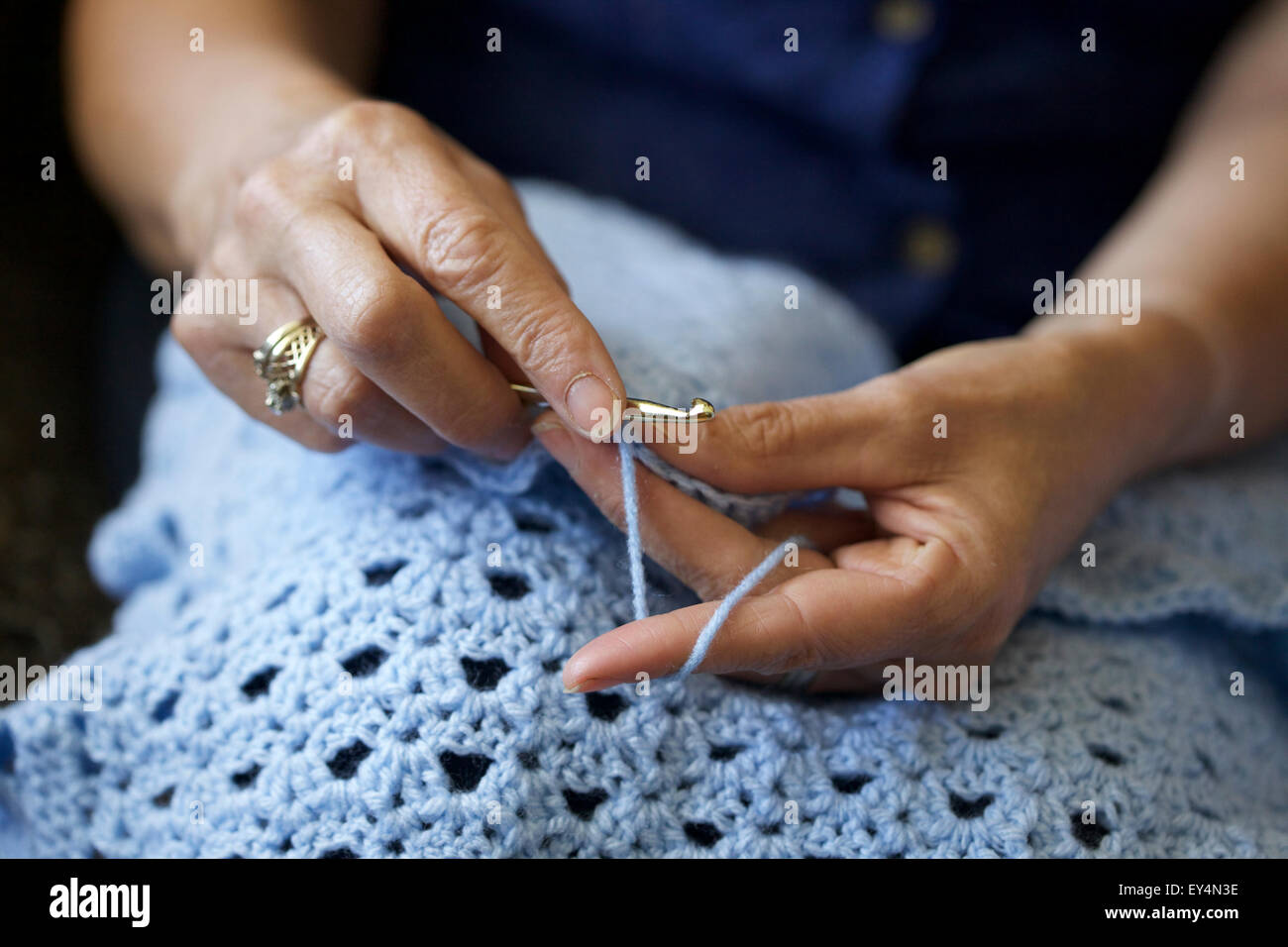 Close up picture of a Caucasian woman crocheting at home Stock Photo ...