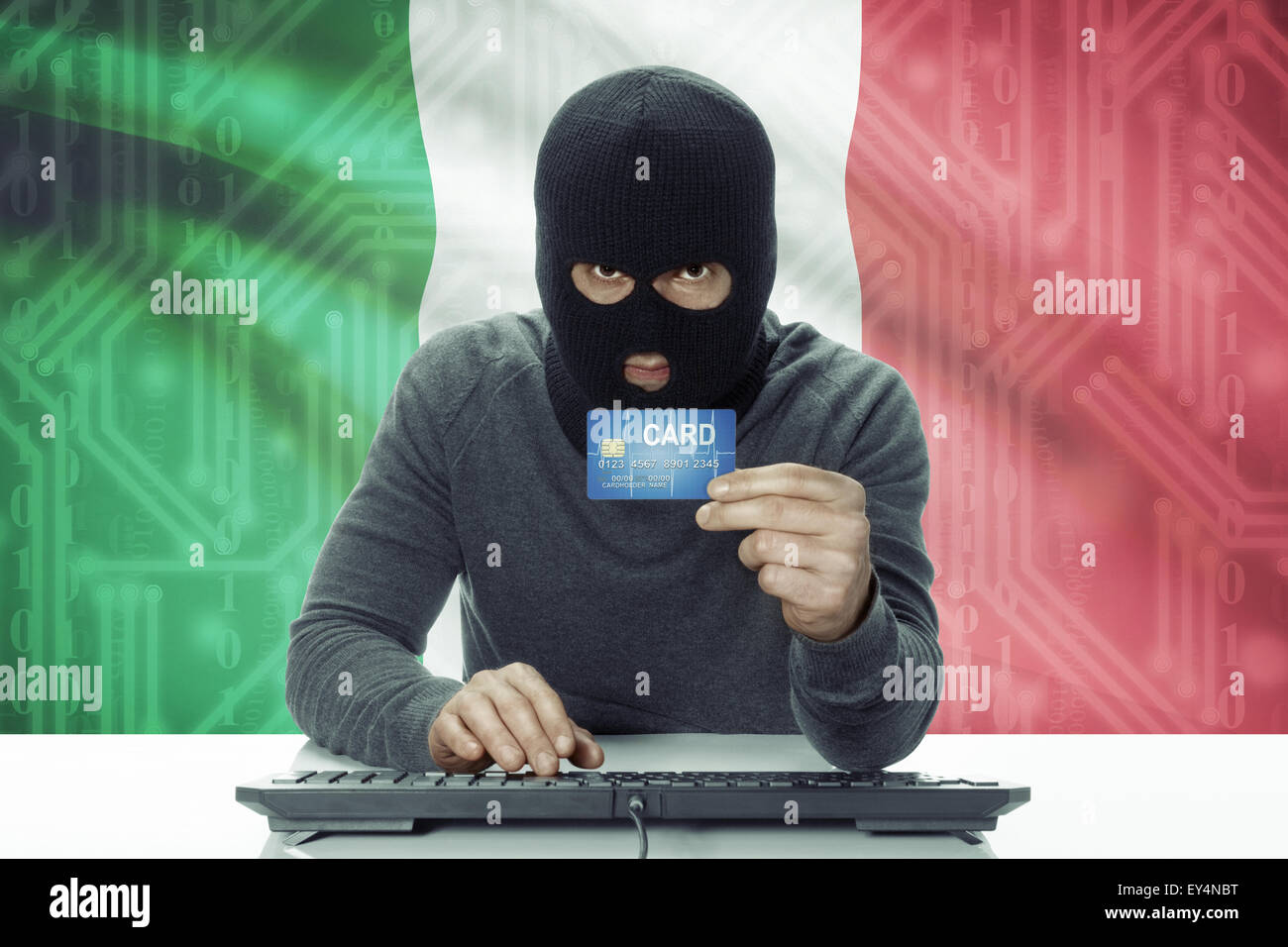Dark-skinned hacker with credit card and flag on background - Italy ...
