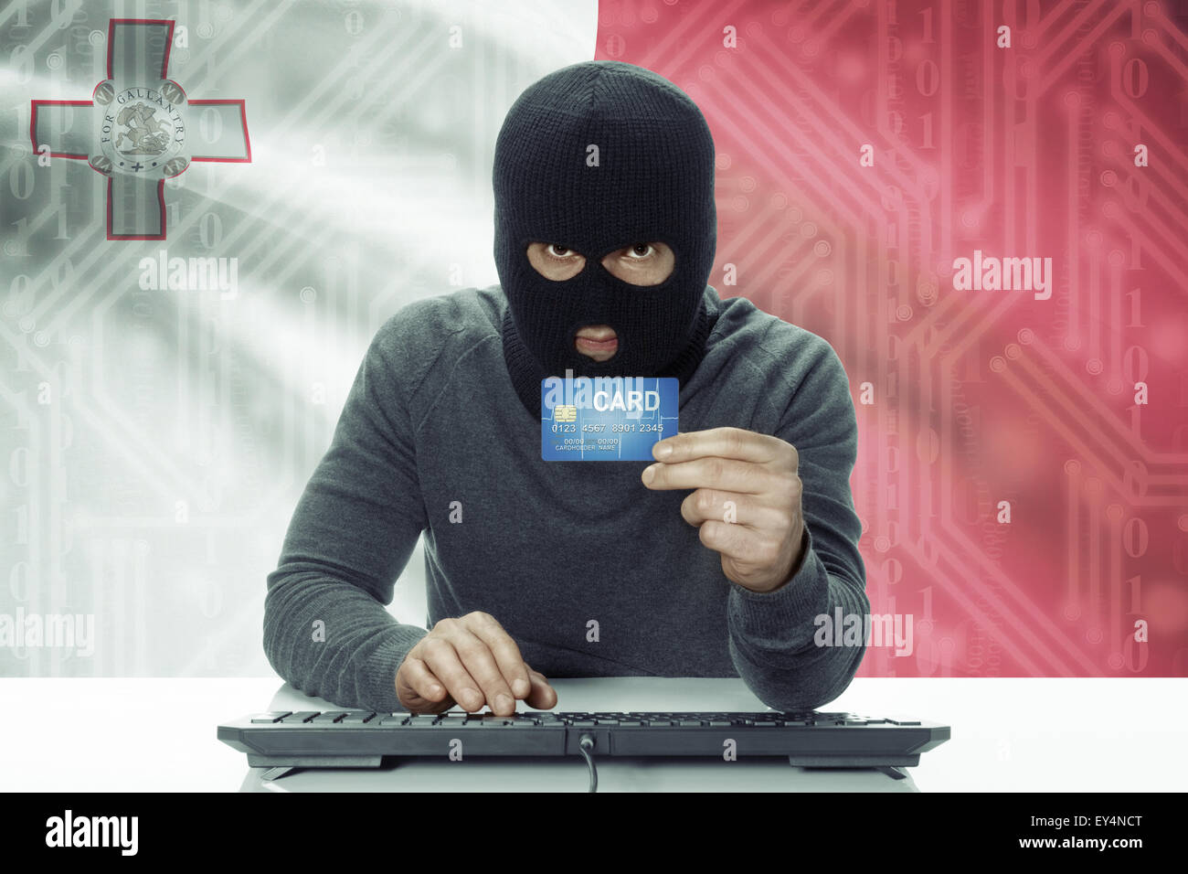 Dark-skinned hacker with credit card and flag on background - Malta ...