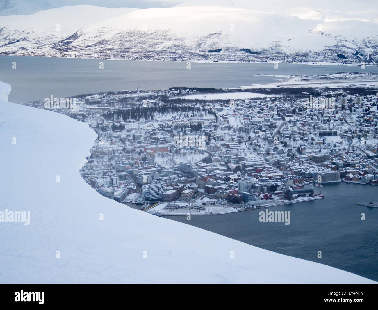 Snow line and Tromso city Stock Photo - Alamy