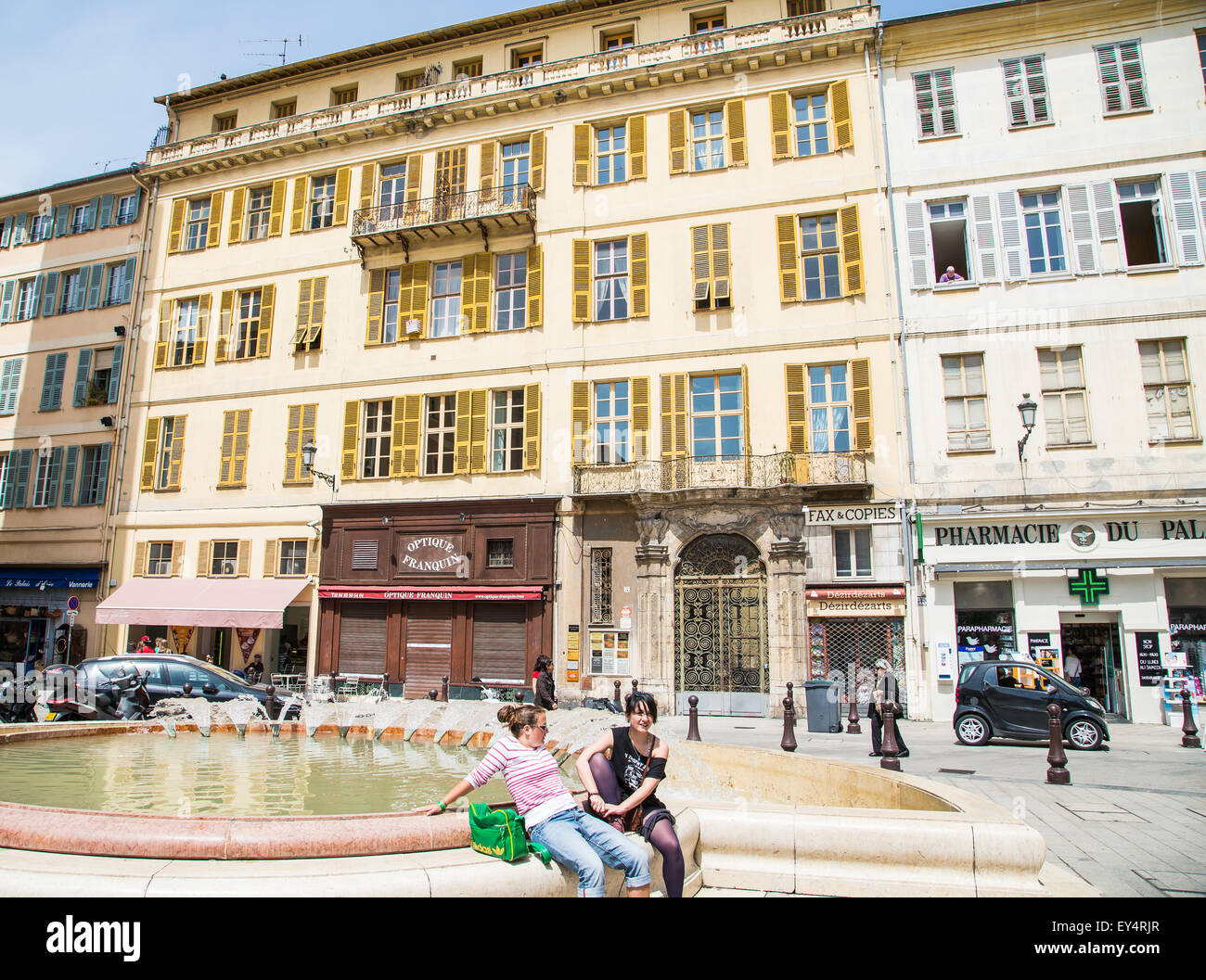 Tourists around a nice fountain in a square in Nice, France Stock Photo ...