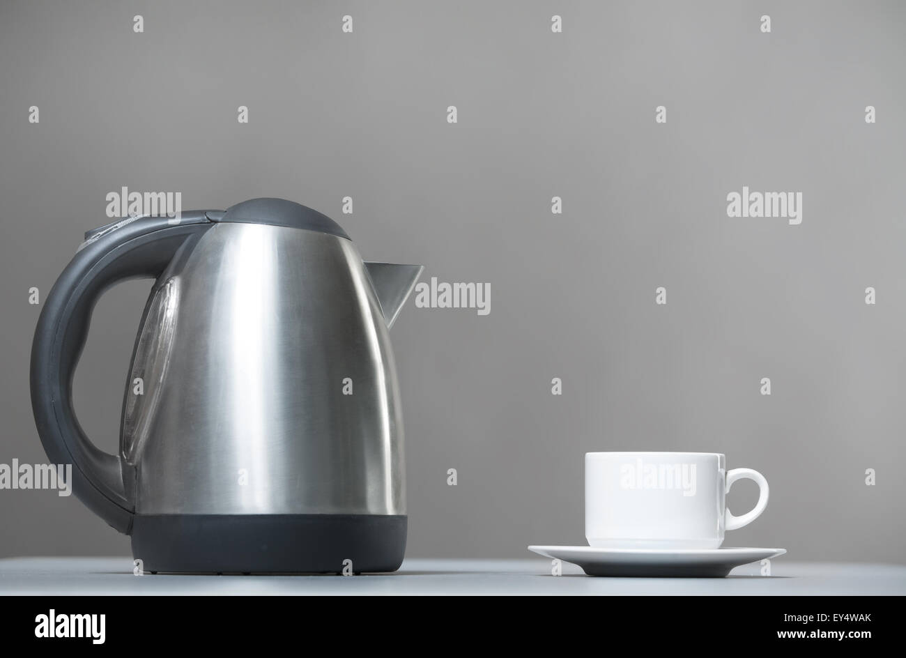 Kitchen kettle and cup Stock Photo - Alamy