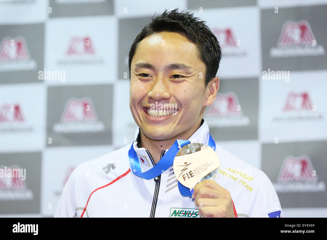 Tokyo, Japan. Ota won the gold medal in the men's foil individual ...