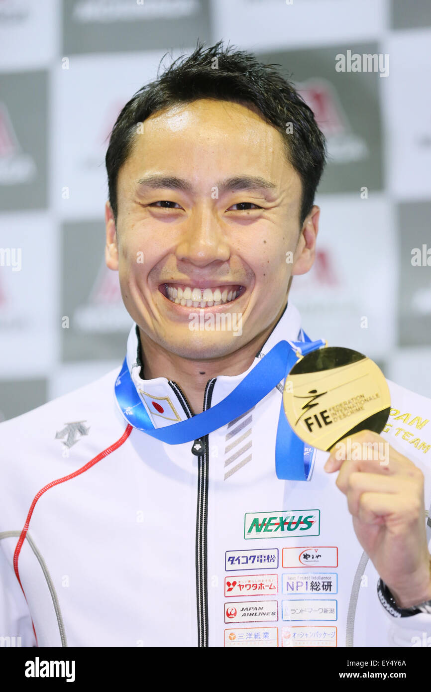 Tokyo, Japan. Ota won the gold medal in the men's foil individual ...
