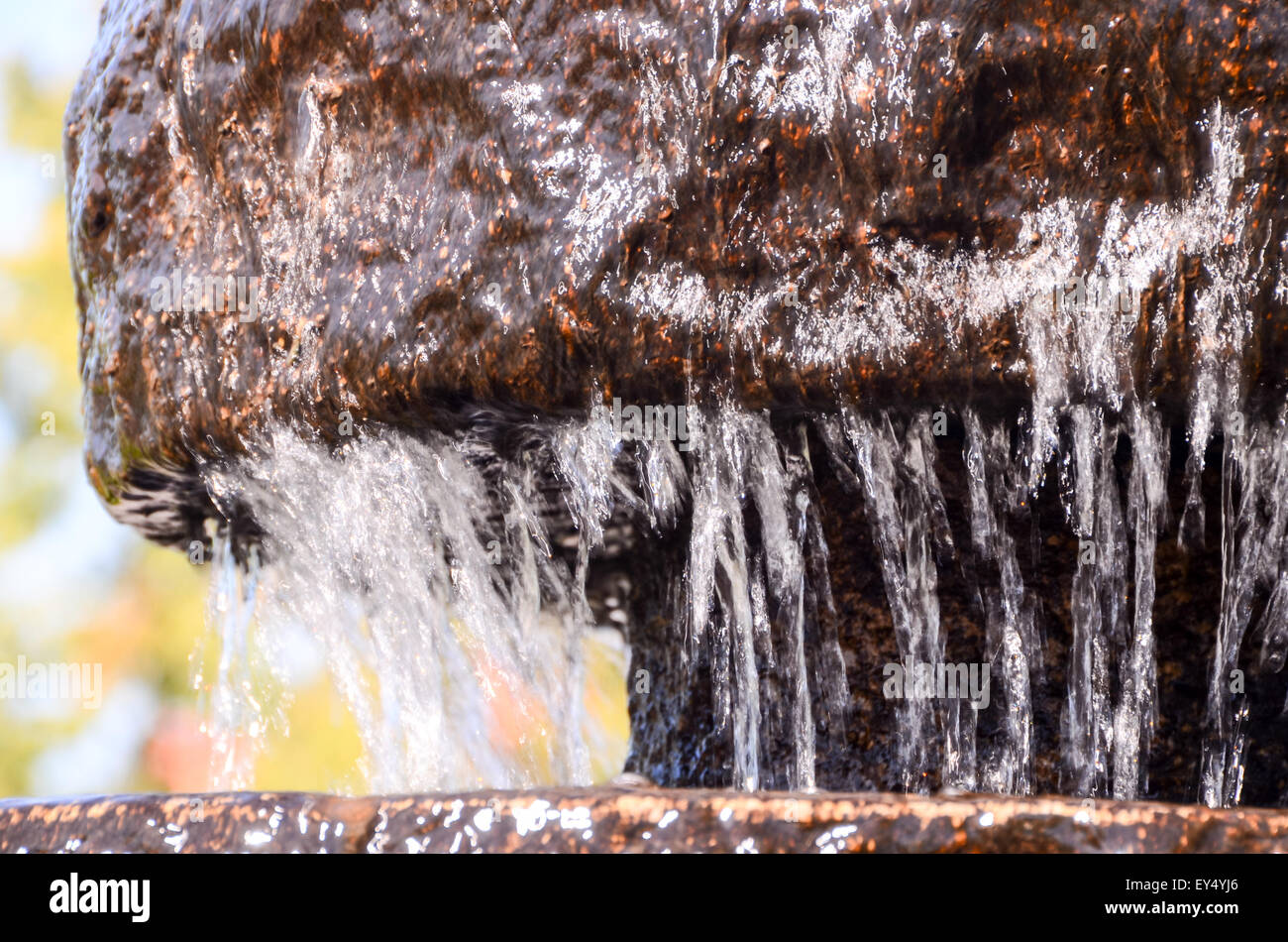 Water Dropping From a Fountain Stock Photo - Alamy