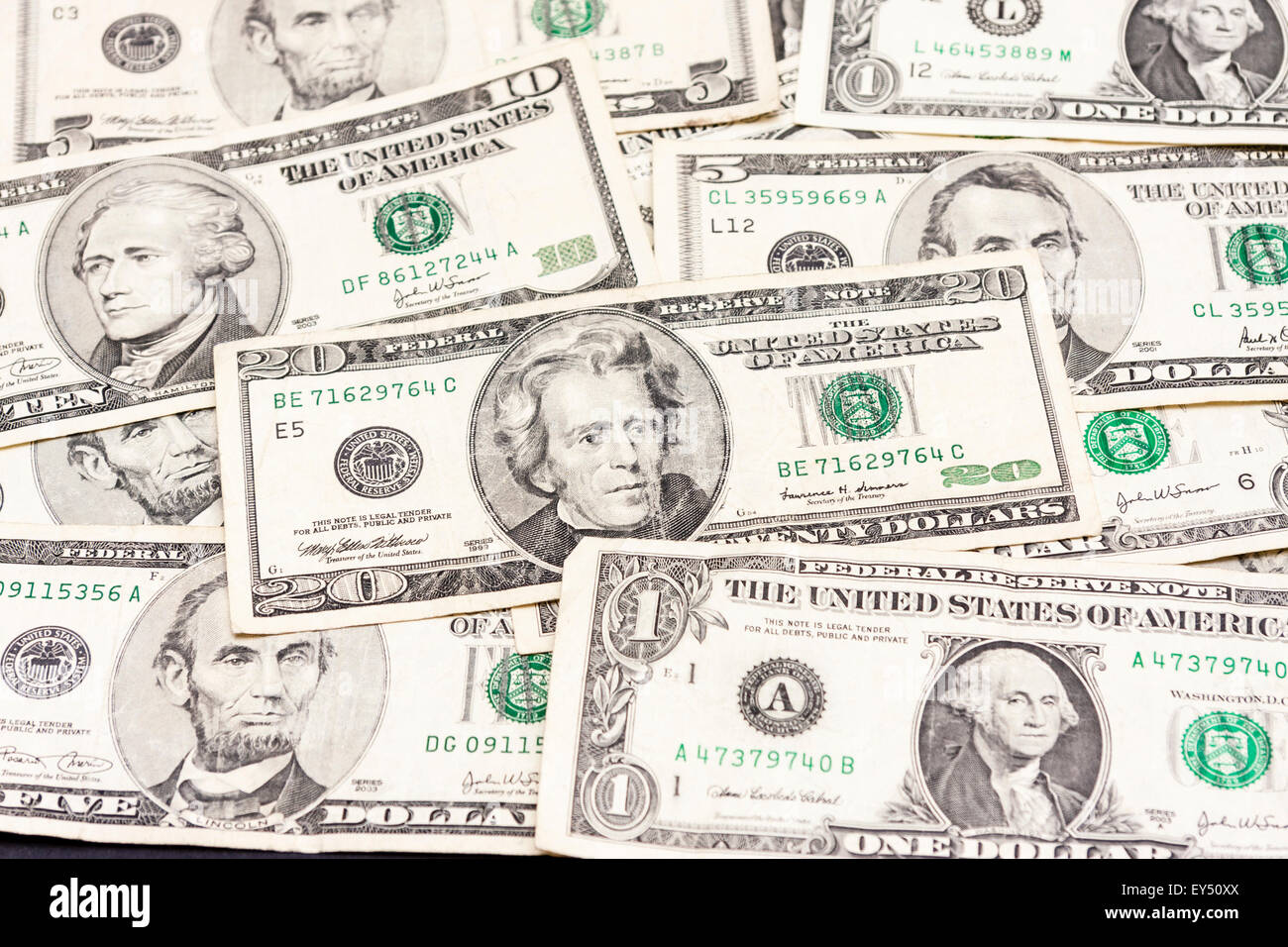 Background of US dollar bills, banknotes, various values. 1, 5, 10 and ...