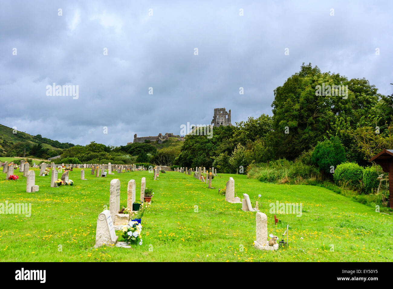 Graveyard cemetery at Corfe village with trees on three sides and in ...