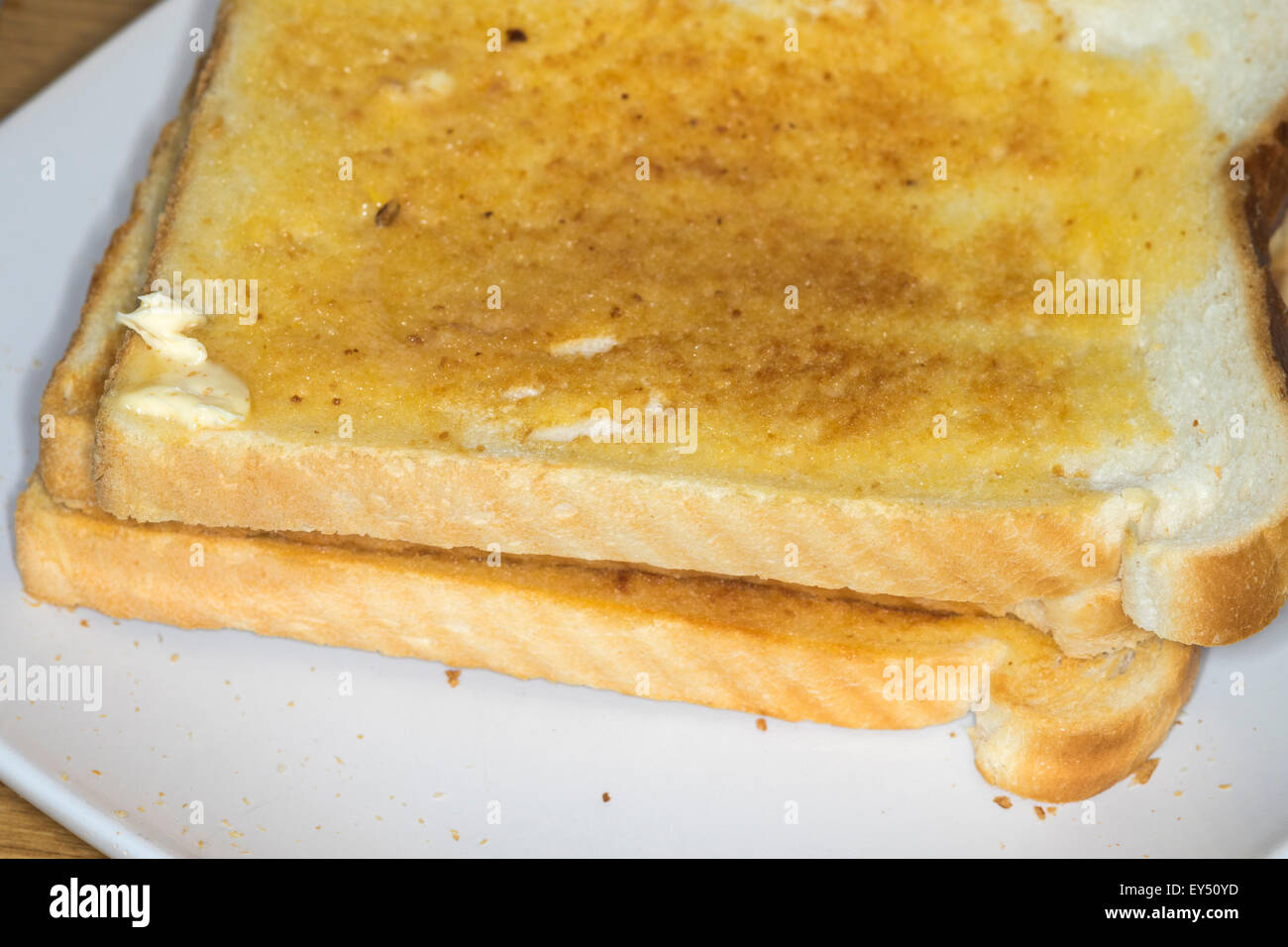 Buttered white sliced bread hi-res stock photography and images - Alamy