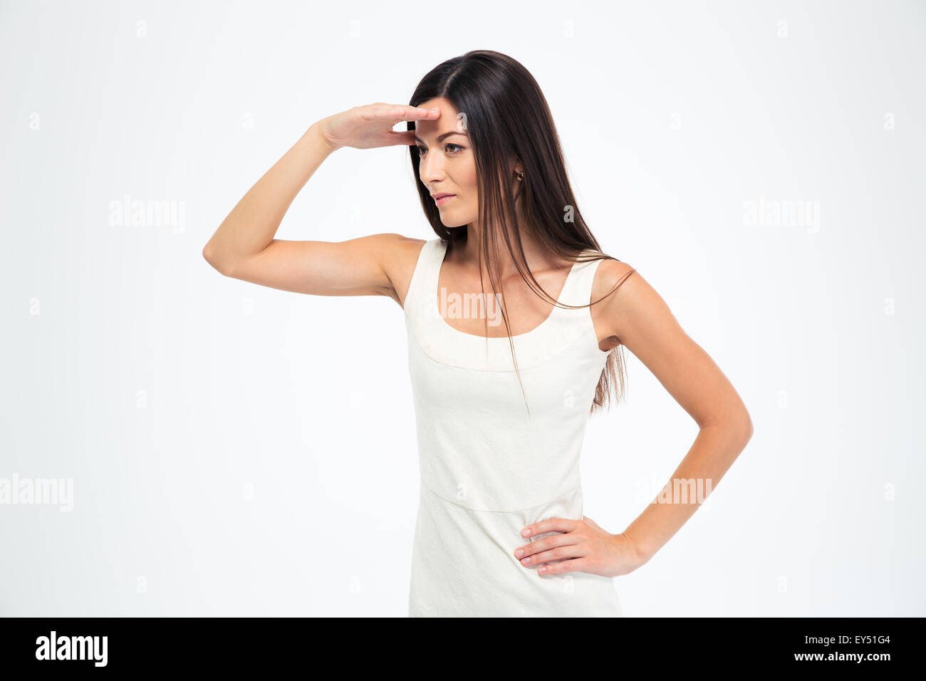 Beautiful woman looking into the distance isolated on a white ...