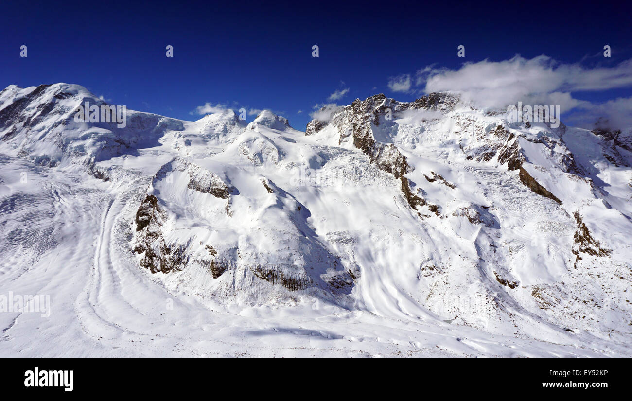 snow alps mountains view and blue sky, zermatt, switzerland Stock Photo ...