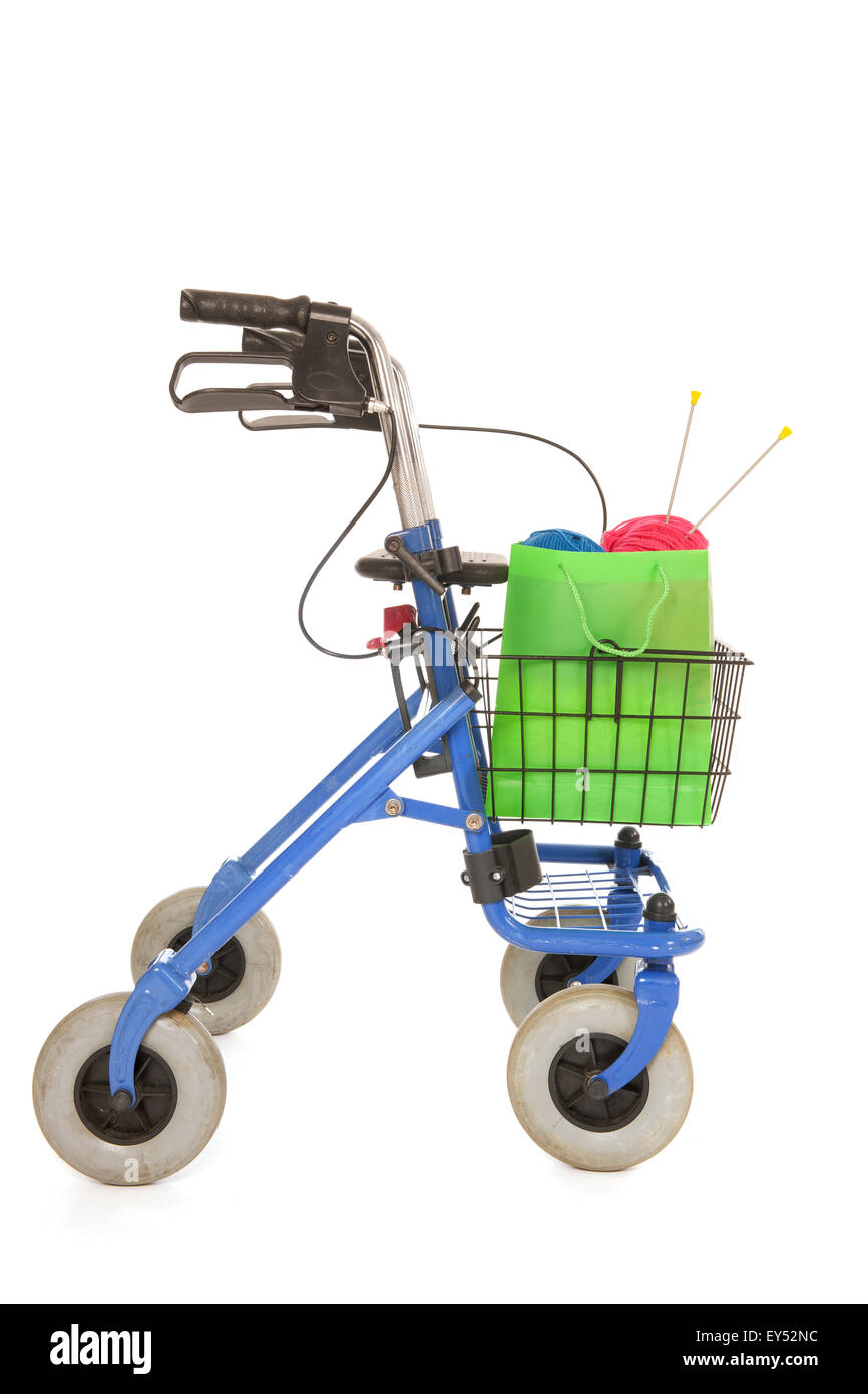 Blue walker with handbrakes and basket isolated over white background ...