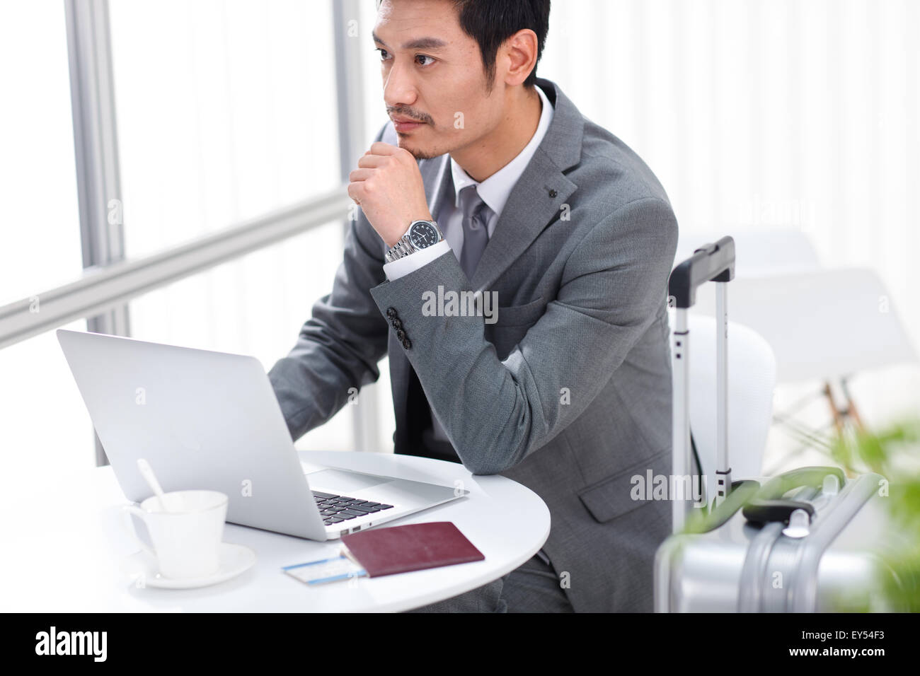 Portrait of businessman on trip Stock Photo - Alamy
