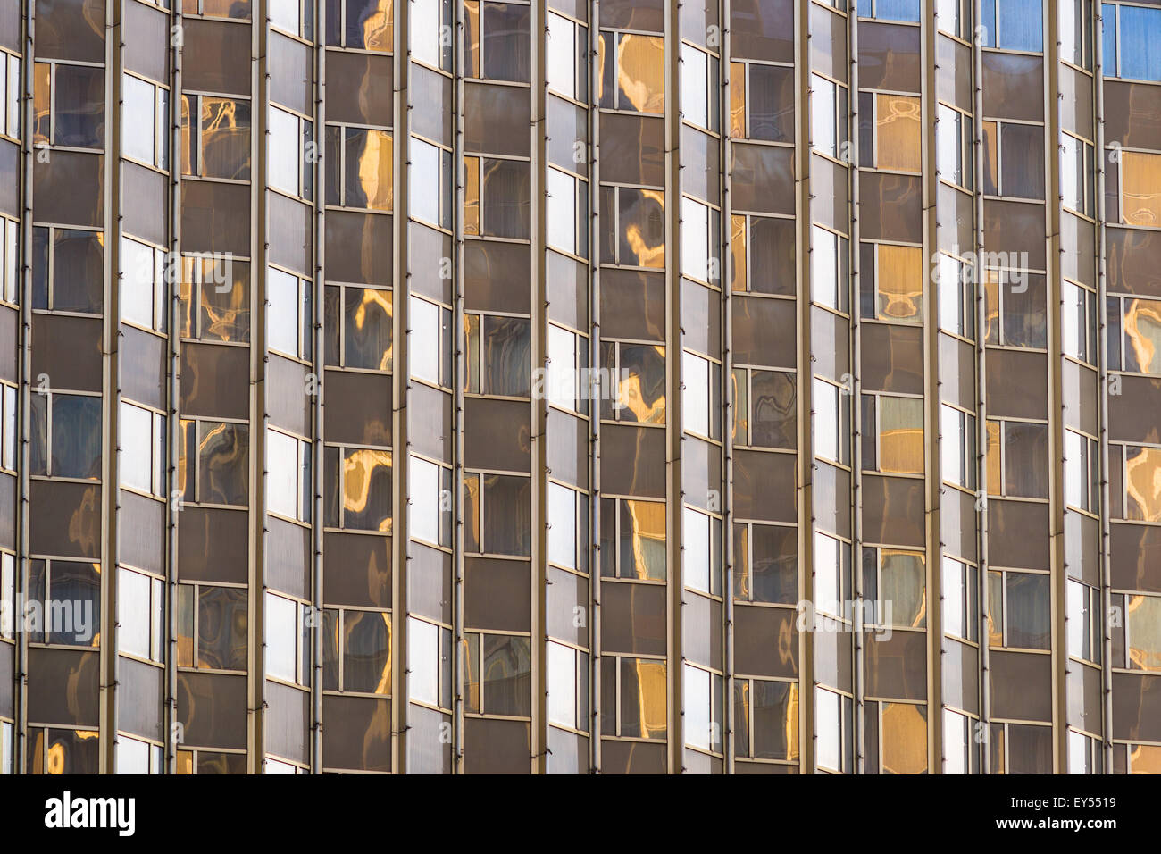 Wall of windows. Facade of glass and concrete of the modern tall ...