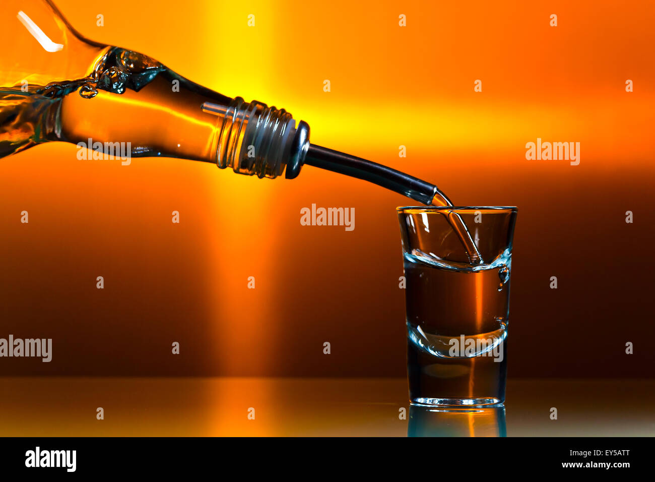 vodka in bar on a glass table Stock Photo - Alamy