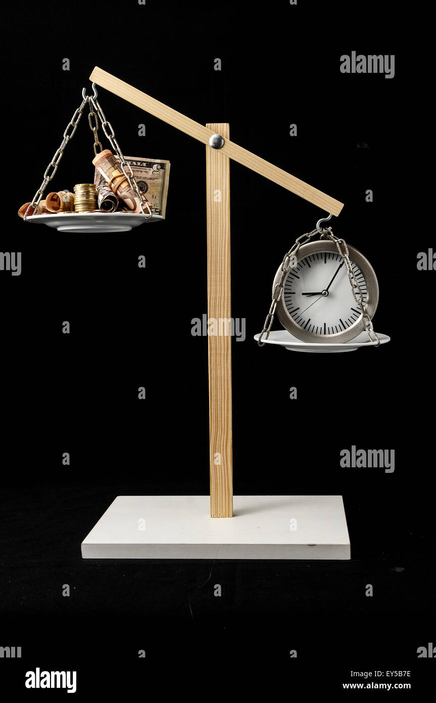 Clock and Currency Time is Money Concept Stock Photo - Alamy