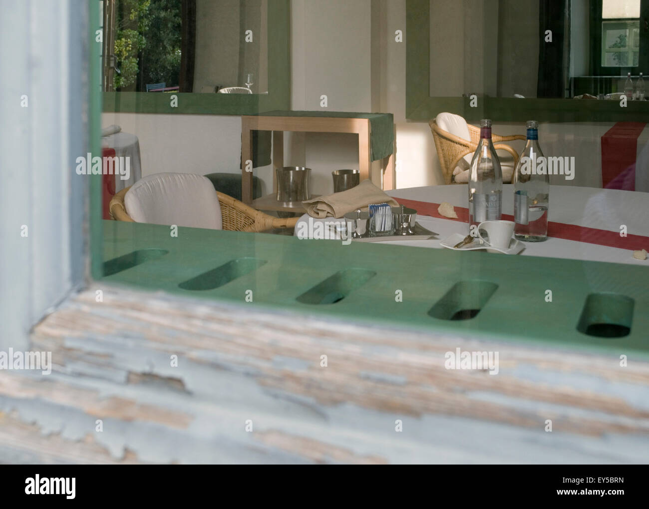 restaurant table seen through glass window Stock Photo - Alamy