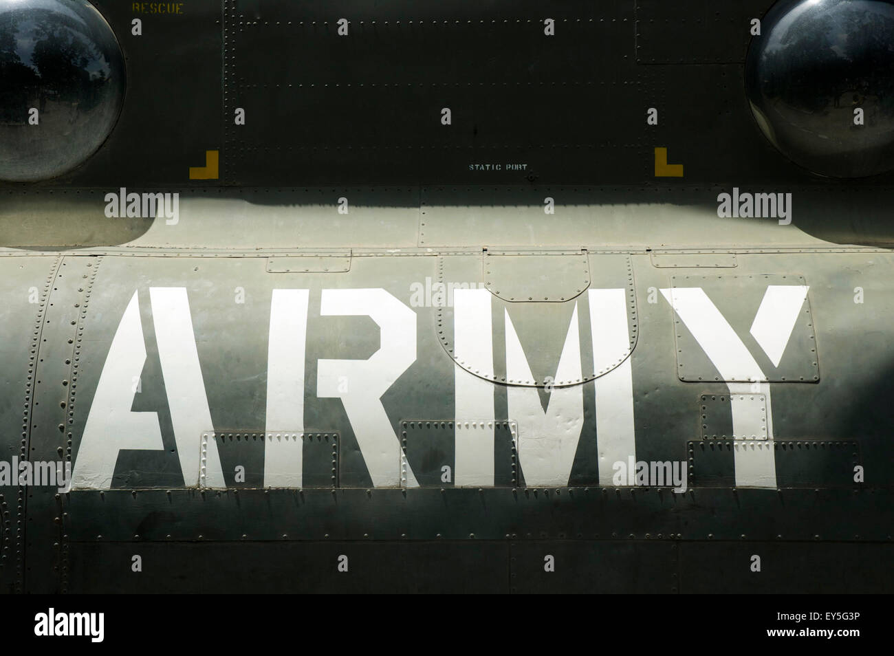 White Army stencil on the side of an olive green Chinook helicopter in ...