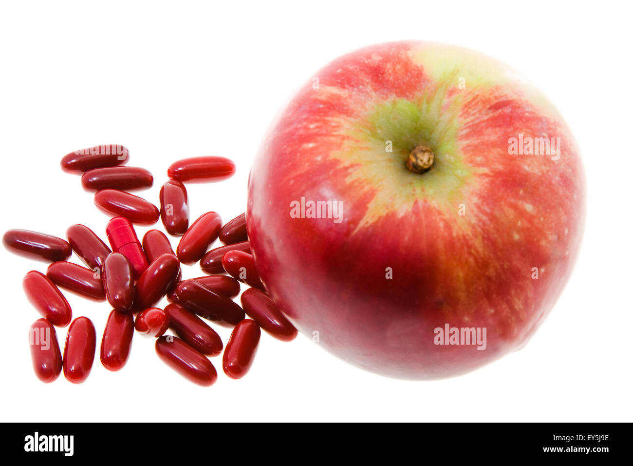 Red Apple and pill Stock Photo - Alamy