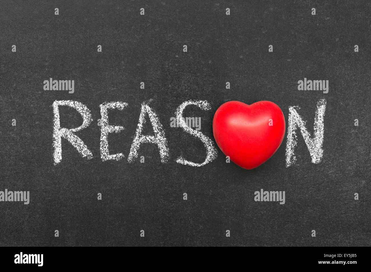 reason word handwritten on blackboard with heart symbol instead of O ...