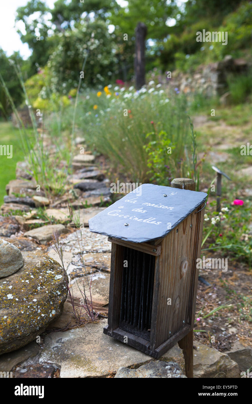 Ladybug house in a garden Stock Photo - Alamy