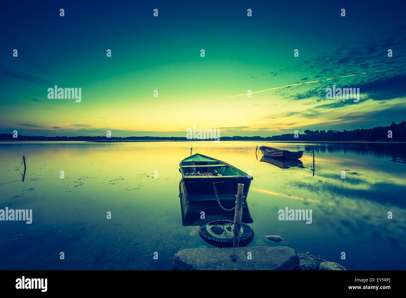 Vintage photo of beautiful lake sunset. Polish lake in Mazury lake ...
