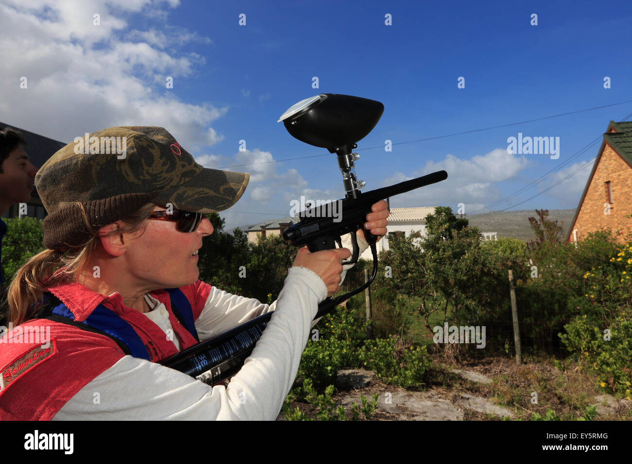 Conflict between man and baboon in urban areas. A group of people ...