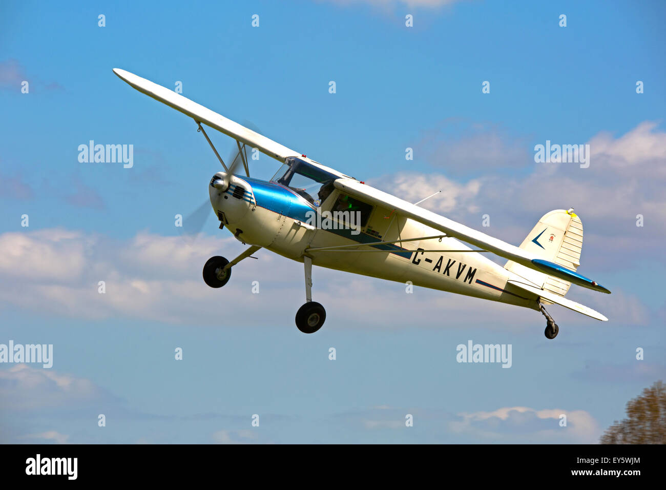 Cessna 120 G-AKVM in flight take-off from Breighton Airfield Stock ...