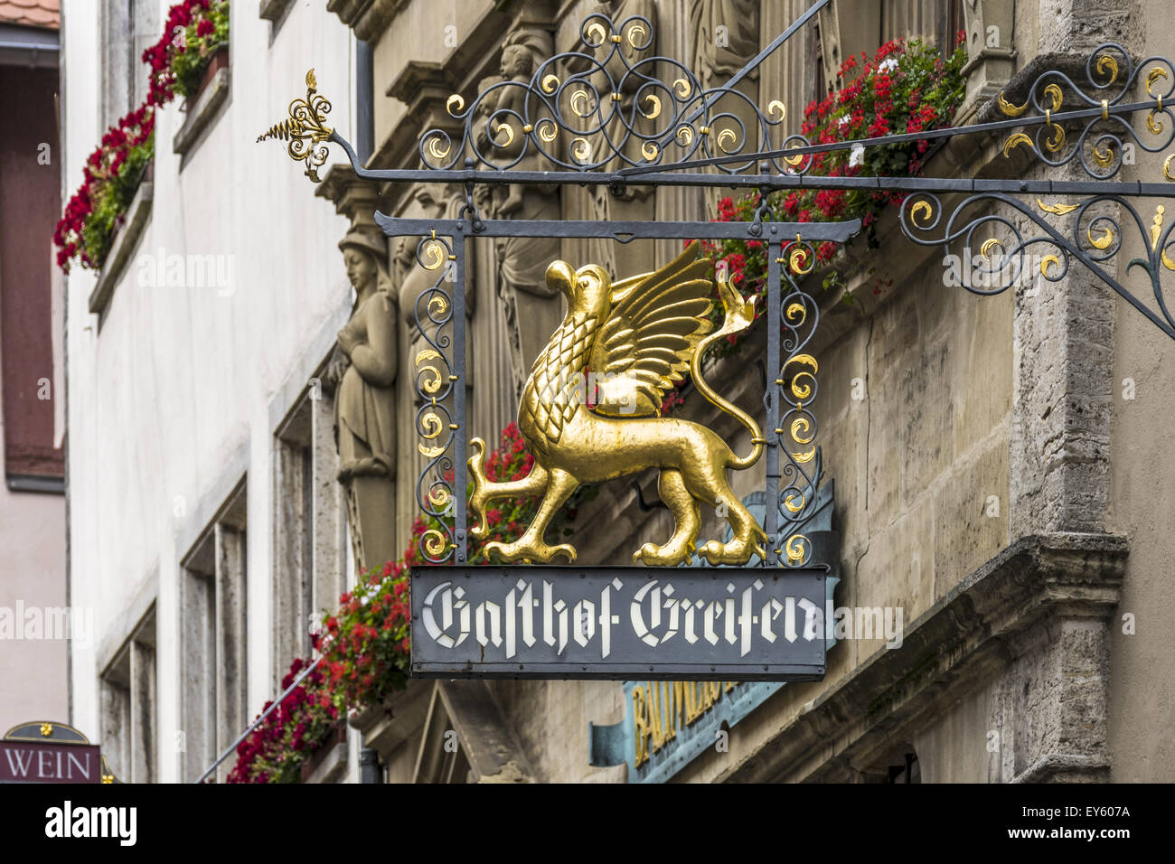 Hanging sign of the restaurant Gasthaus Greifen, Rothenburg ob der ...